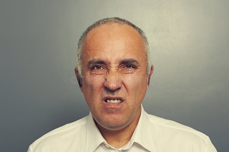 Discontented Senior Man Talking on the Phone Stock Image - Image of ...