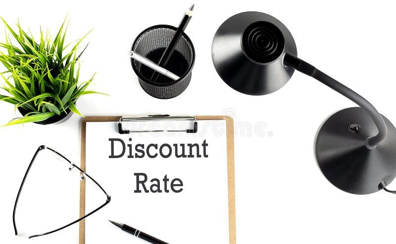 DISCOUNT RATE Text on a Clipboard on the White Background Stock Image ...