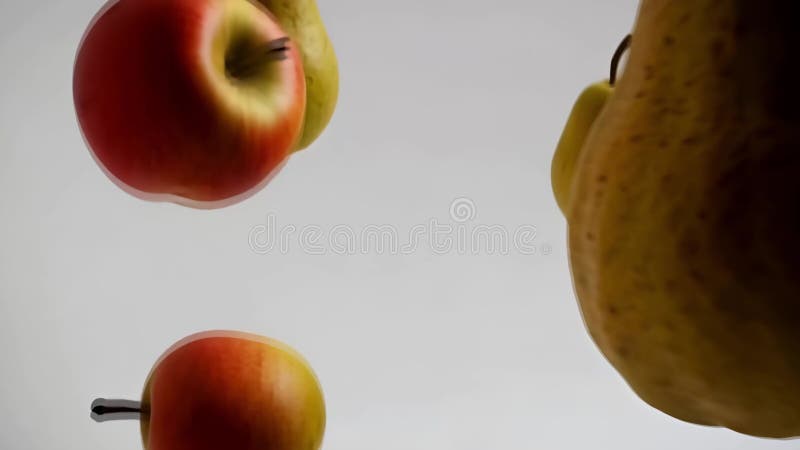 Discover the Mesmerizing Dance of Floating Pears and a Vibrant Apple in ...