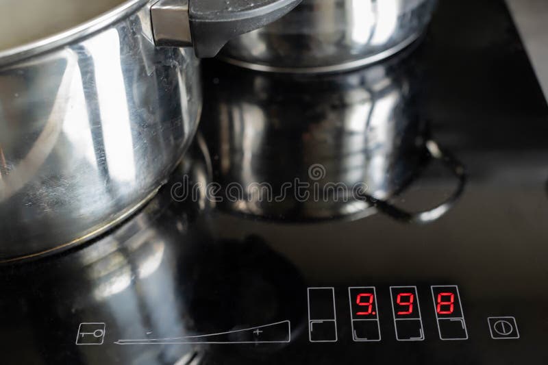 Discover the Modern Induction Cooktop that Comes with Pots and Features ...