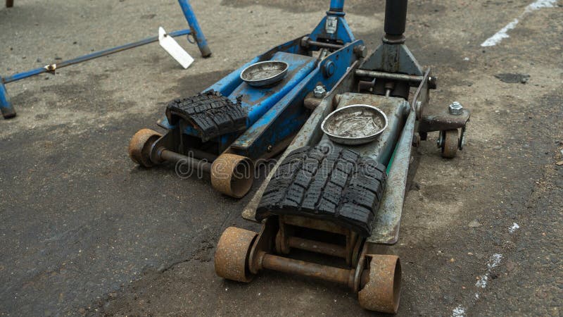 Discover Vintage Pneumatic Jacks at a Tire Change Service, Showcasing ...