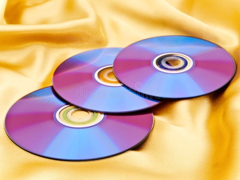 Discs on fabric stock photo. Image of shiny, drape, material - 11526582