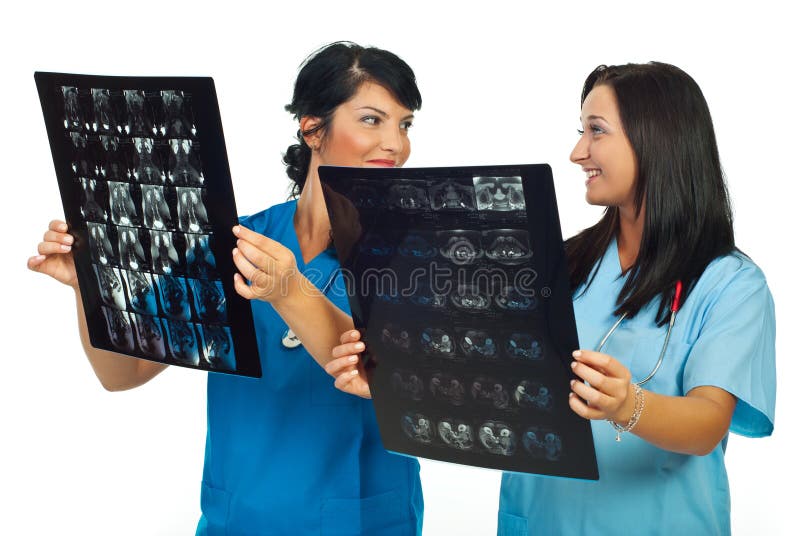 Discusión Sonriente De Dos Doctores Sobre MRI Imagen de archivo ...