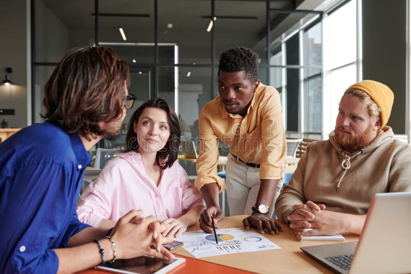 Discussing Analytical Data at Meeting in Office Stock Photo - Image of ...
