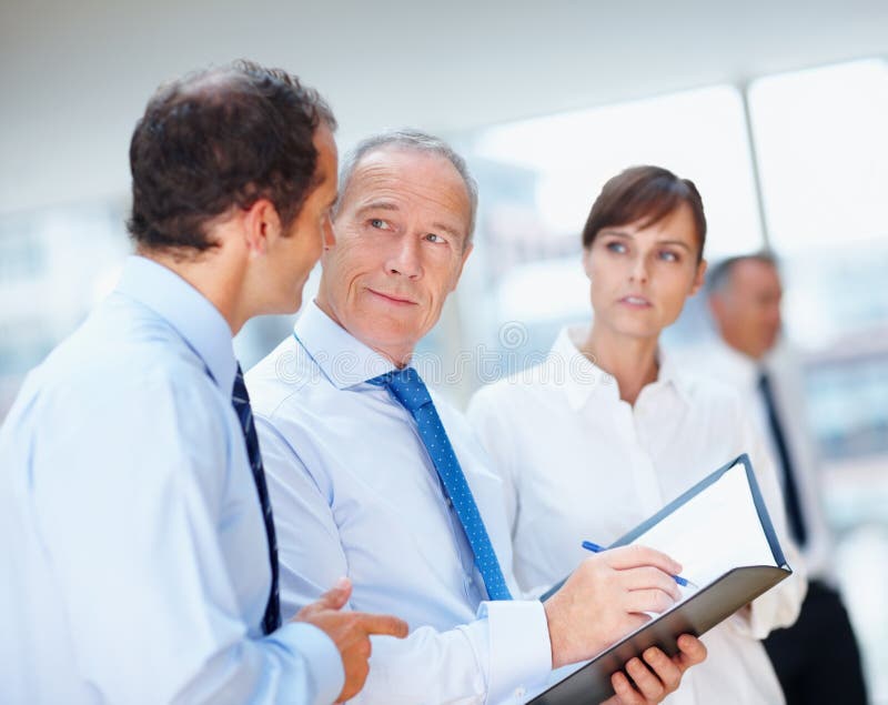 Discussing Business Plan. CEO Listening To Executive Discussing Plan ...