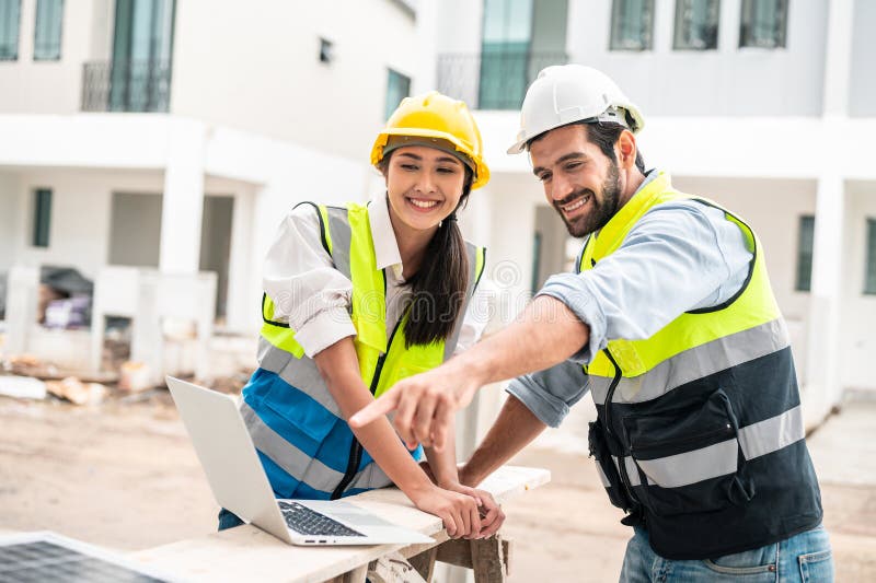 Discussing at the Construction Site of Housing Projects Stock Photo ...
