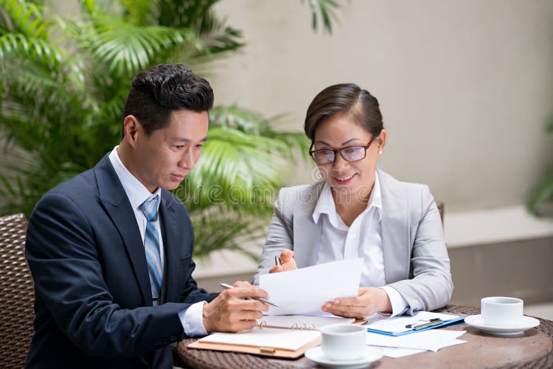 Discussing documents stock photo. Image of discussing - 58558528