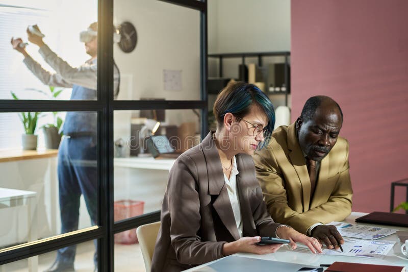 Discussing Graphic Data in Document Stock Image - Image of data, adult ...