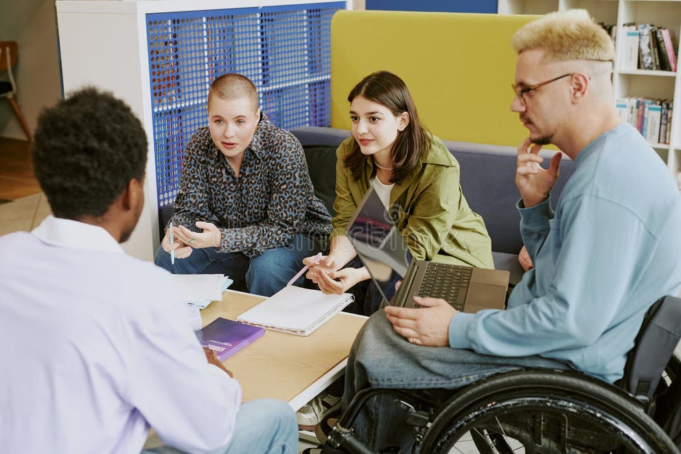 Discussing Group Assignment at Study Table in Library Stock Image ...