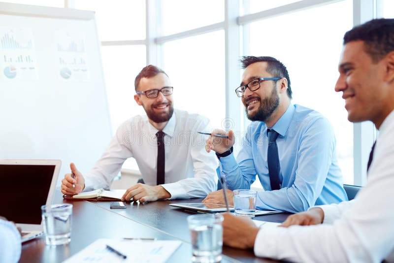 Discussing ideas stock image. Image of cooperation, group - 34415043