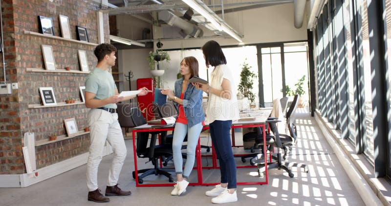 Discussing Interior Design Project, Multiracial Colleagues ...