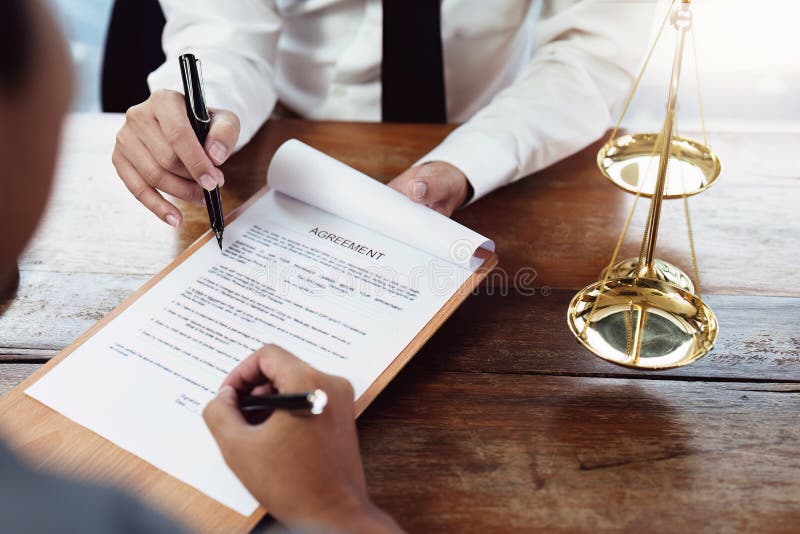 Discussing Legal Matters and Signing Important Documents Stock Image ...