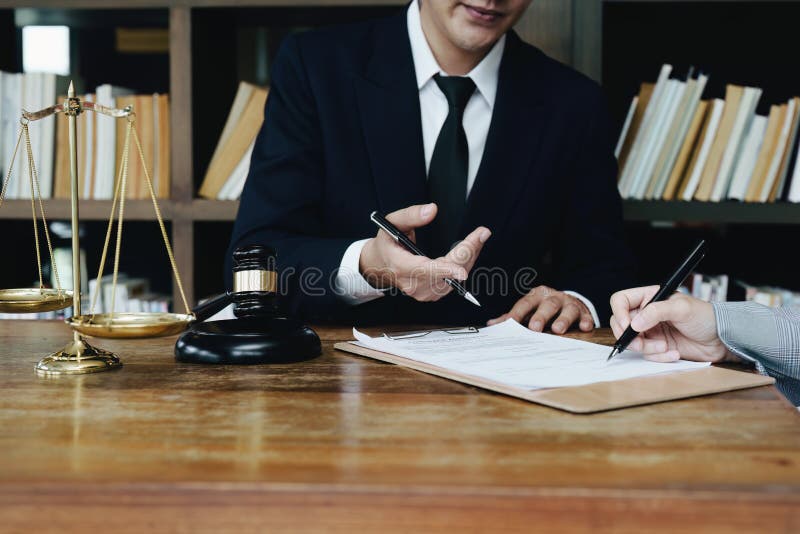 Discussing Legal Matters and Signing Important Documents Stock Image ...