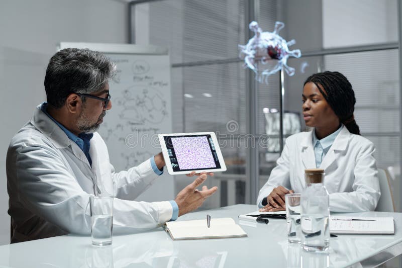 Discussing Medical Research Findings in Modern Laboratory Stock Image ...