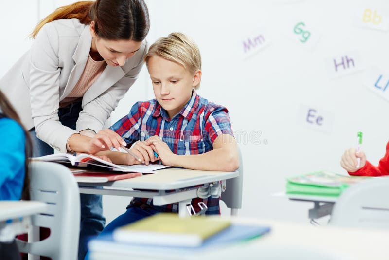 Pointing out mistakes stock image. Image of schoolkid - 136542281