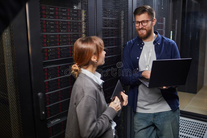Discussing Network Maintenance in Data Center Setting Stock Photo ...