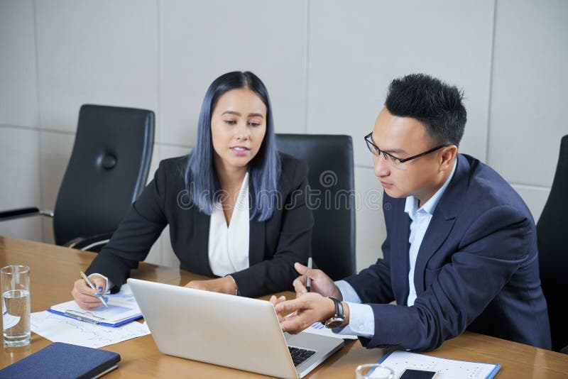 Discussing Project Development Stock Image - Image of laptop, executive ...