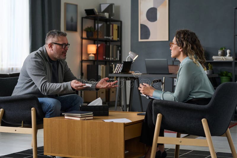 Discussing Project in Modern Office Setting Stock Image - Image of ...