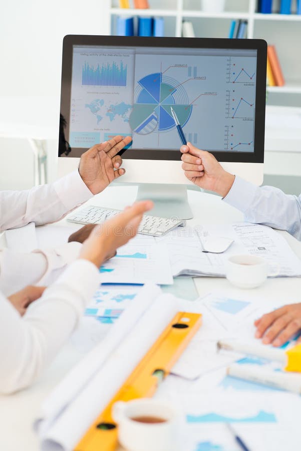 Discussing statistics stock image. Image of business - 53222285