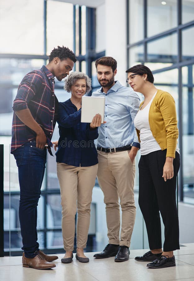 Discussing Their Plans. a Group of Creatives Working Together on a ...