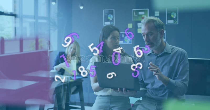 Discussing Work on Laptop, Colleagues in Office with Floating Numbers ...