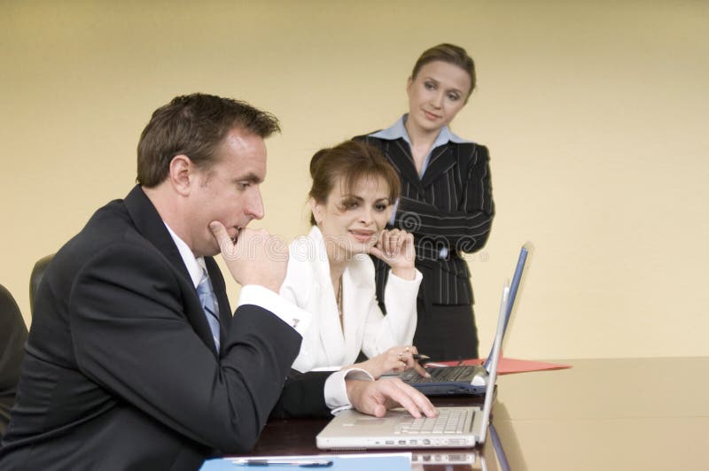 Discussion in the Boardroom Stock Photo - Image of laptop, boardroom ...