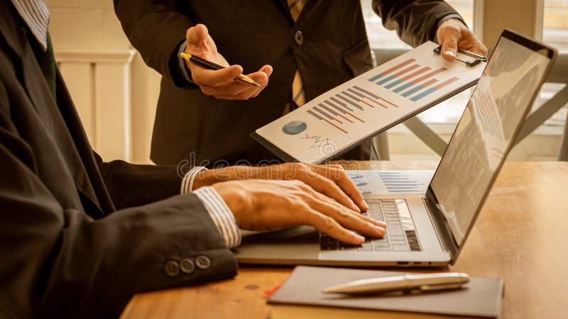 Discussion of Business Groups in the Meeting Room Using a Computer on a ...