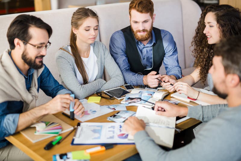 Discussion of designers stock image. Image of planning - 78318335