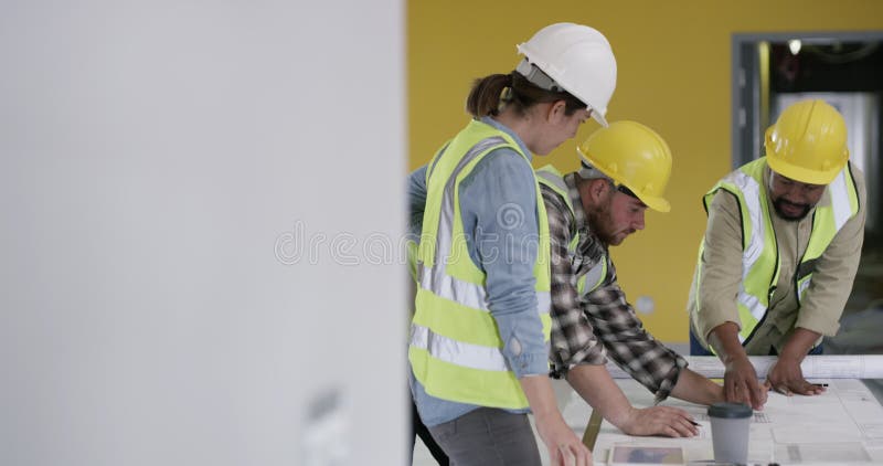 Discussion, Floor Plan and Team of Engineers Planning for Construction ...