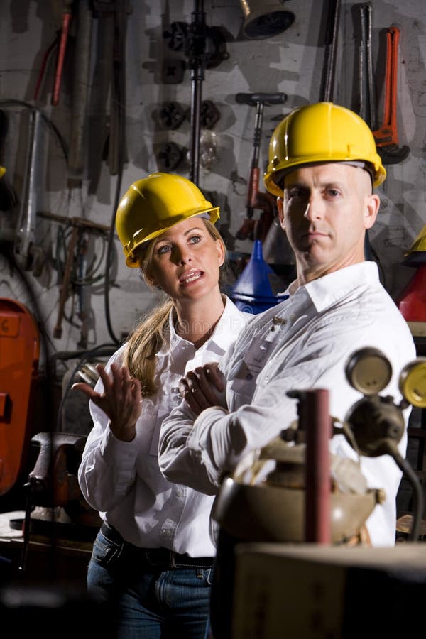 Colleagues in Maintenance Room Stock Image - Image of management ...