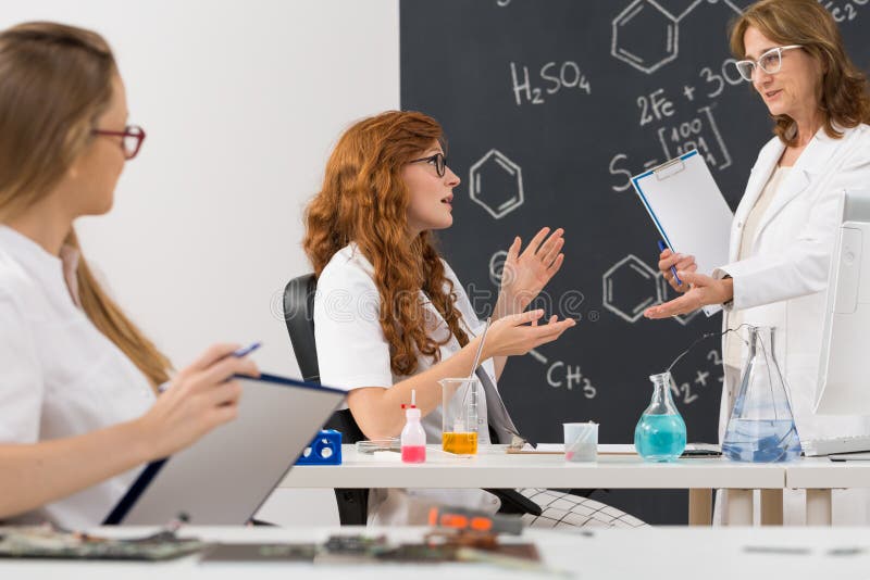 Discussion with Professor in a Classroom Stock Image - Image of teacher ...