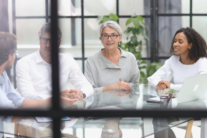 Discussion of Successful Business People in the Office Stock Image ...