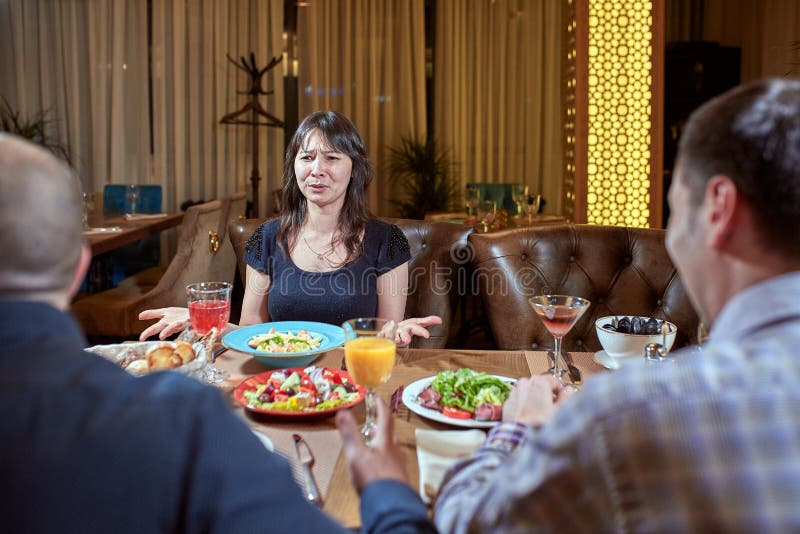 Discussion of Three Angry Friends Arguing in a Coffee Shop Stock Photo ...