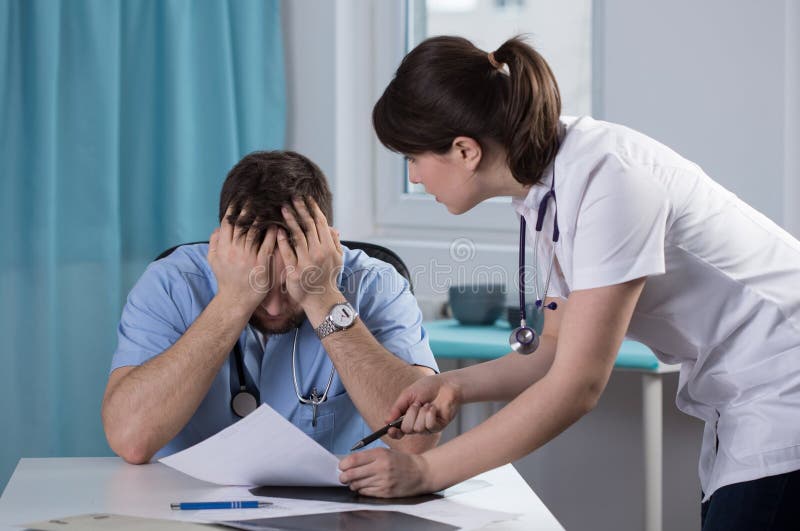 Discussion between Two Medics Stock Image - Image of medic, concerned ...