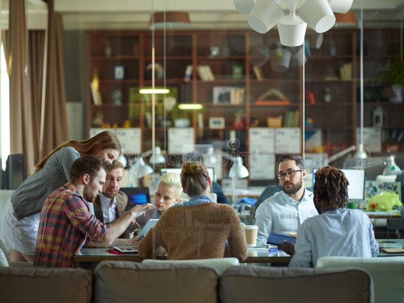 Discussion at workplace stock image. Image of serious - 74237793