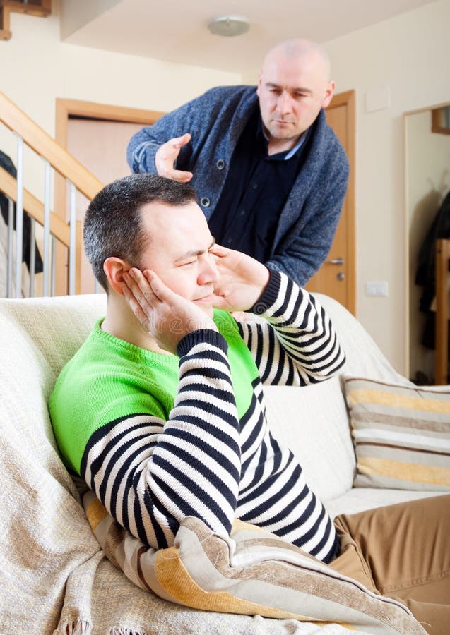 Disgruntled men at home stock photo. Image of stressful - 41288846
