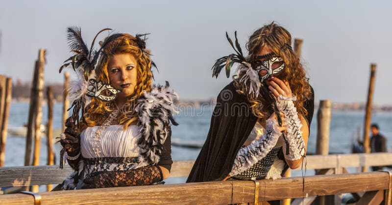 Disguised Women editorial stock photo. Image of couple - 28838408