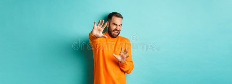 Disgusted Man Cringe and Extending Hands in Protection, Begging for ...