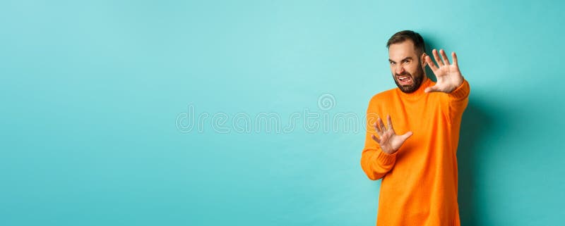 Disgusted Man Cringe and Extending Hands in Protection, Begging for ...