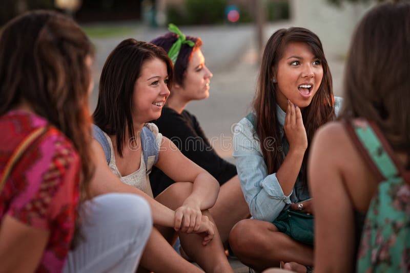 Disgusted Young Woman with Friends Stock Image - Image of ground ...