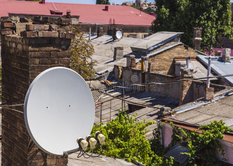 Dish Antennas on Roof stock photo. Image of television - 124491358