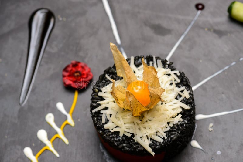 Dish of Black Risotto with Squid Ink Stock Photo - Image of dinner ...