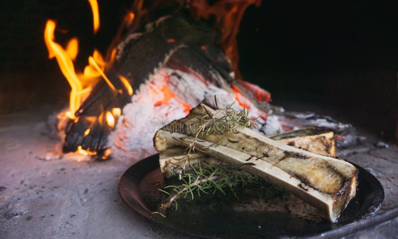 Dish of Bone Marrow Roasted in a Rustic Wood-fired Oven Stock Photo ...