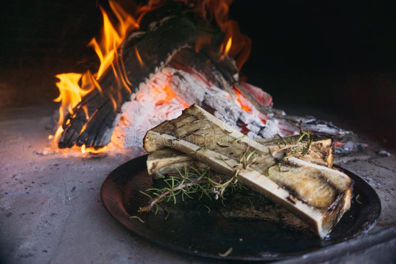 Dish of Bone Marrow Roasted in a Rustic Wood-fired Oven Stock Image ...