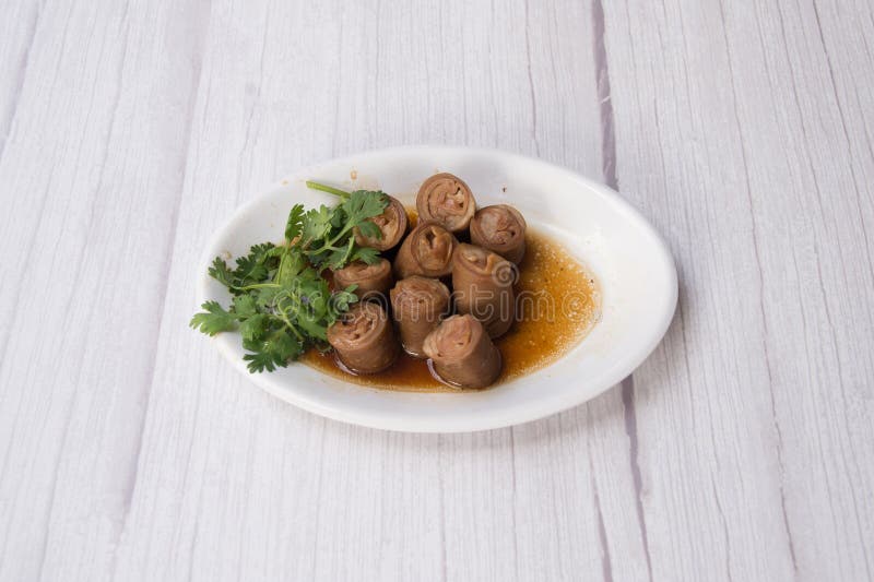 A Dish of Braised Pig Swirly Intestines Chopped and Served Up Stock ...