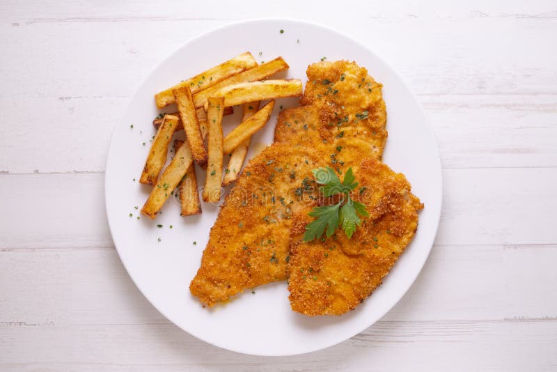 Breaded Chicken Fillet with Potatoes and Salad. Stock Image - Image of ...