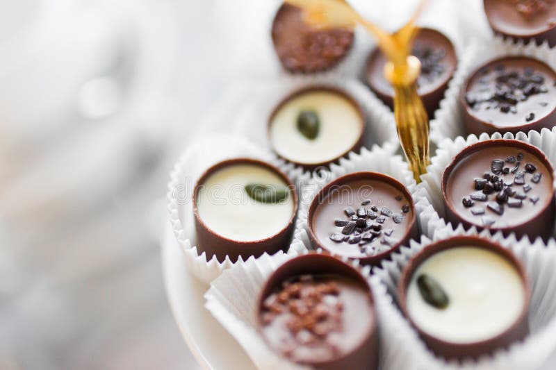 Dish of chocolates stock photo. Image of dish, white - 46536006