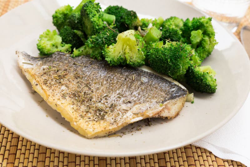 Dish of Fried Dorado Fish Fillet with Boiled Broccoli Stock Image ...