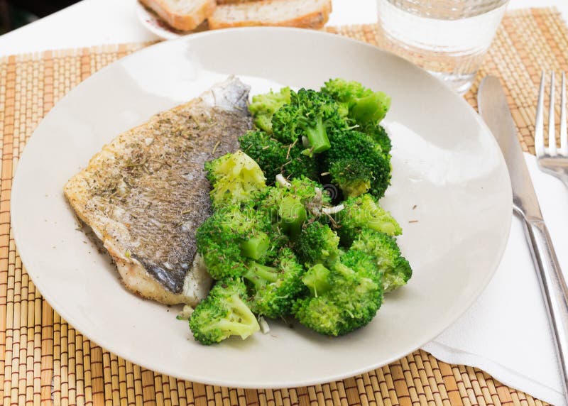 Dish of Fried Dorado Fish Fillet with Boiled Broccoli Stock Photo ...