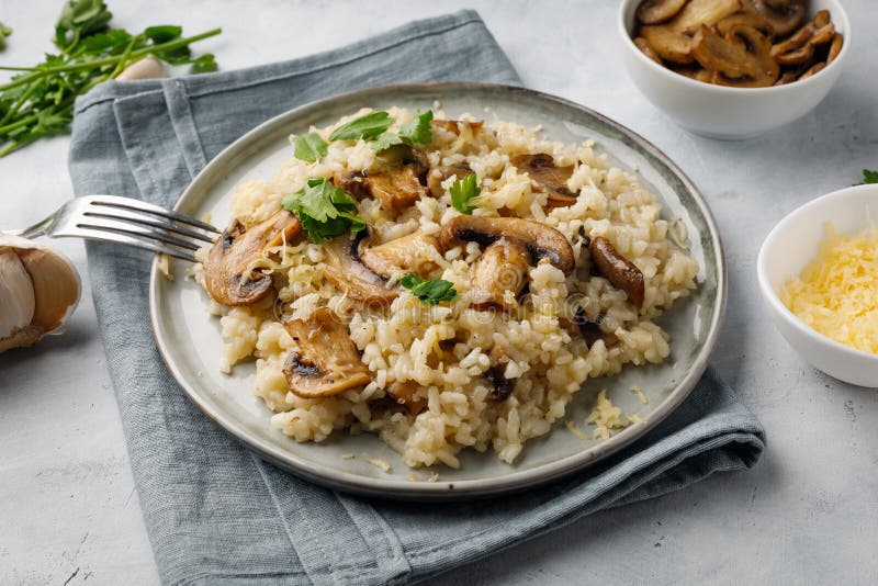 A Dish of Italian Cuisine - Risotto from Rice and Mushrooms Stock Image ...